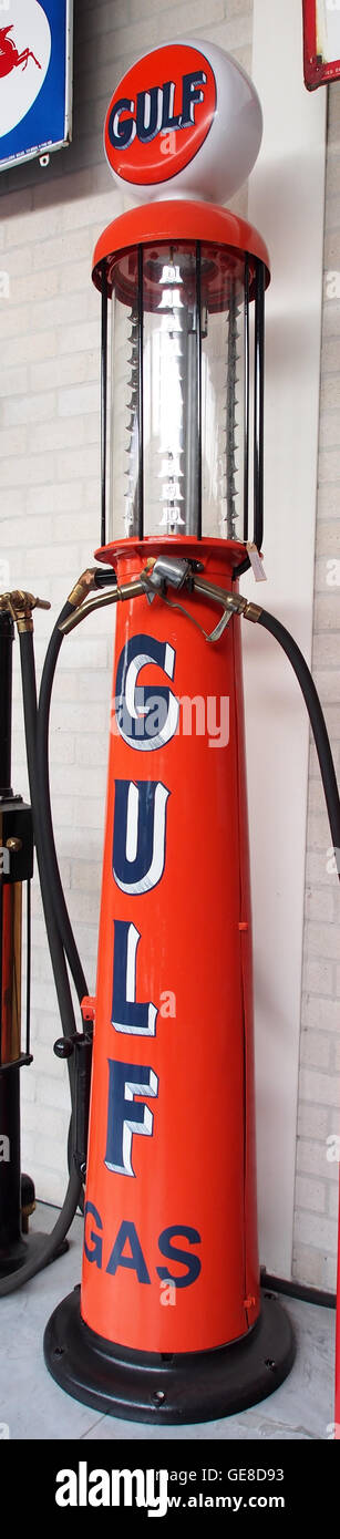 This image shows an early 20th-century gas pump from Oude Gulf Gas ...