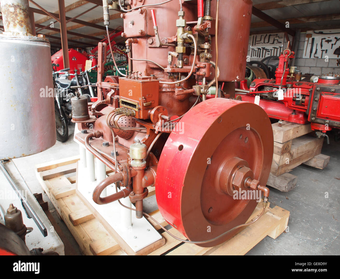 This image features an old stationary engine displayed at the Museum ...