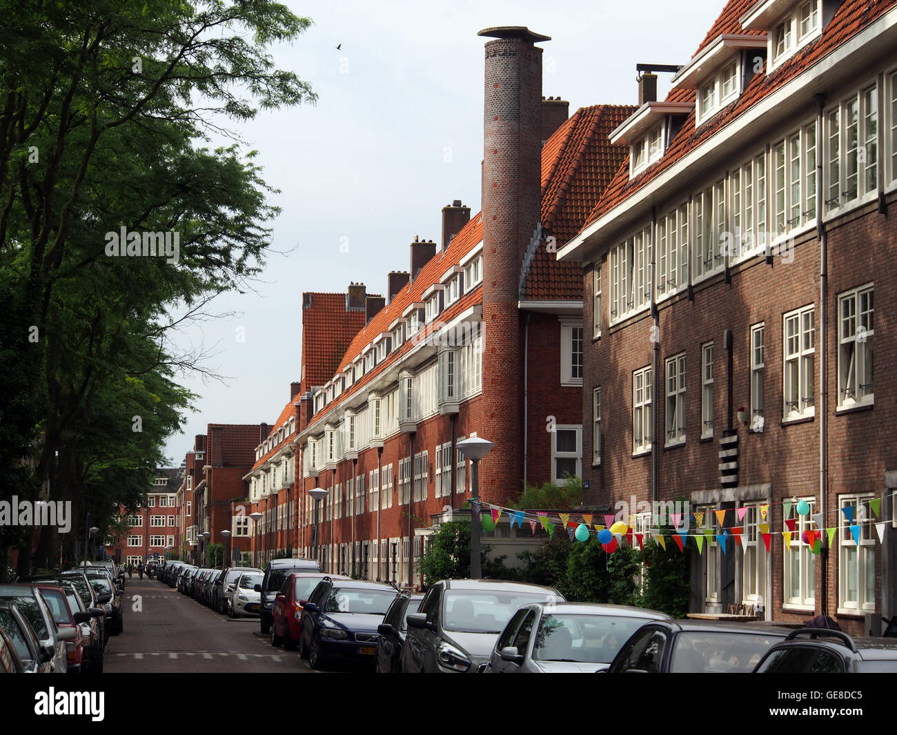 The photograph captures a historical view of Paramaribostraat, a street ...