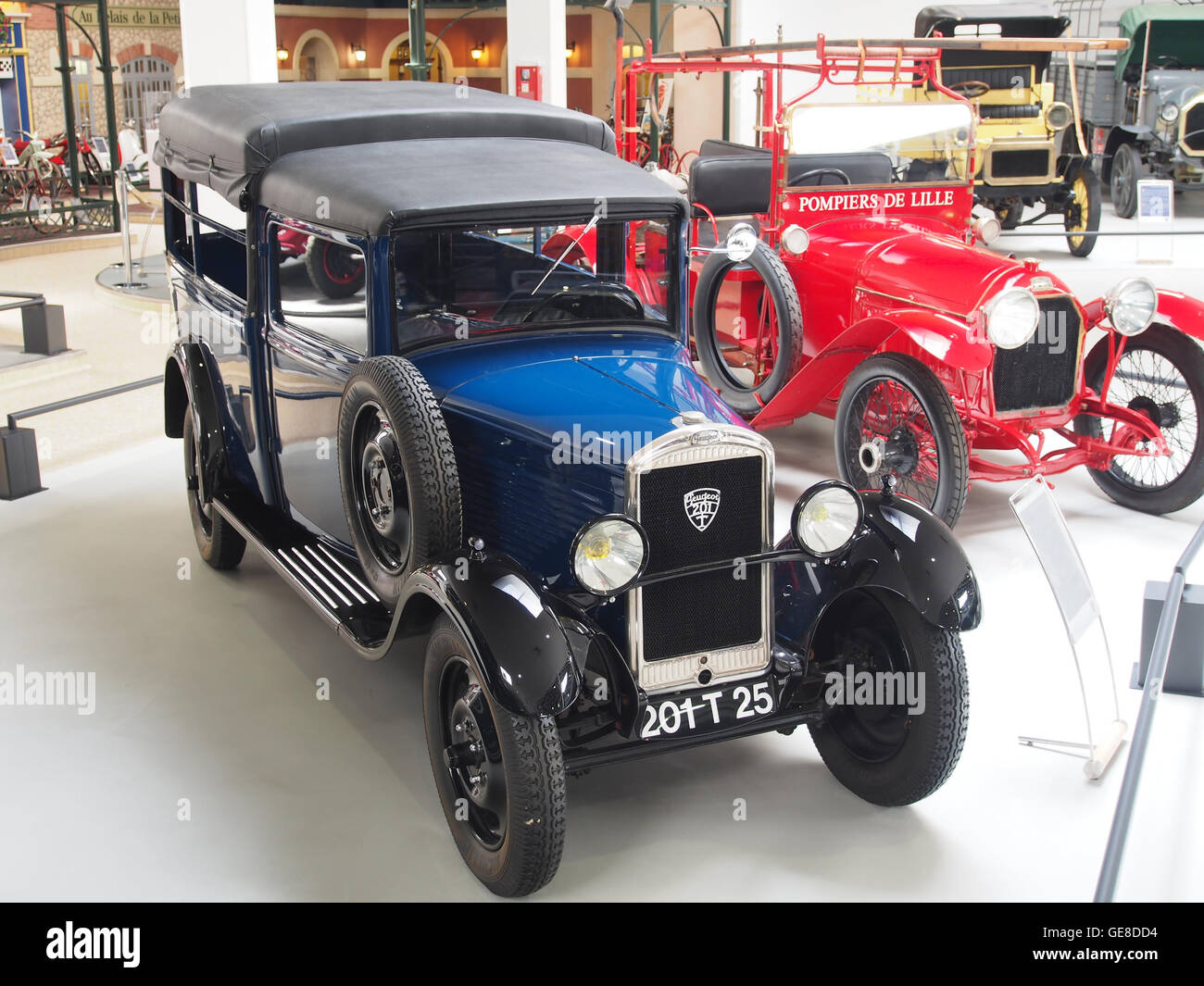 A vintage photograph of the Peugeot 201, an early 20th-century compact ...