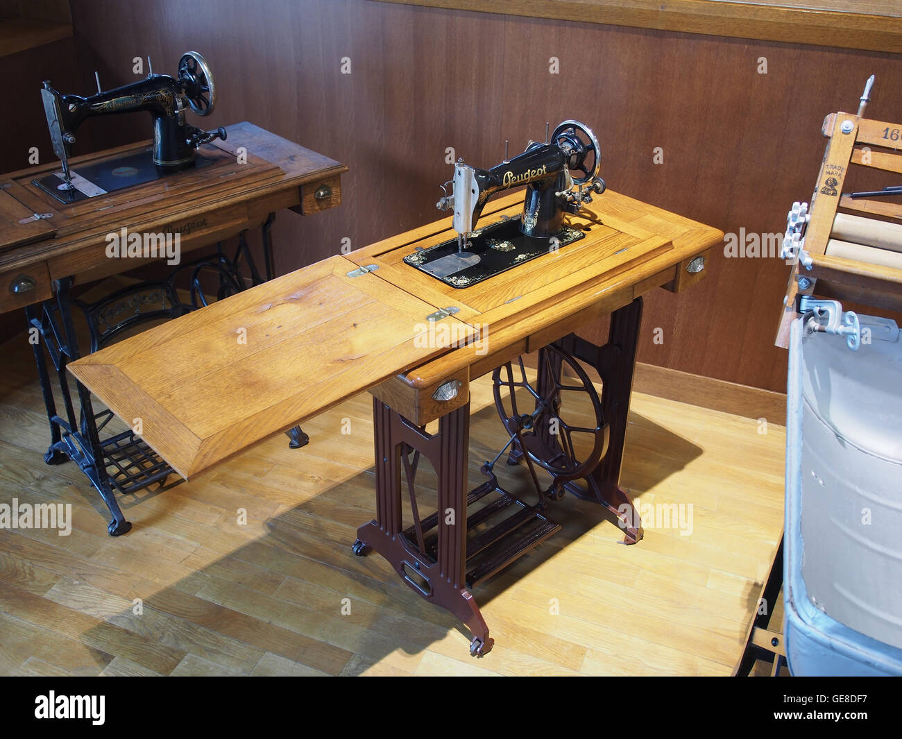 This historic image of a Peugeot sewing machine showcases the ...