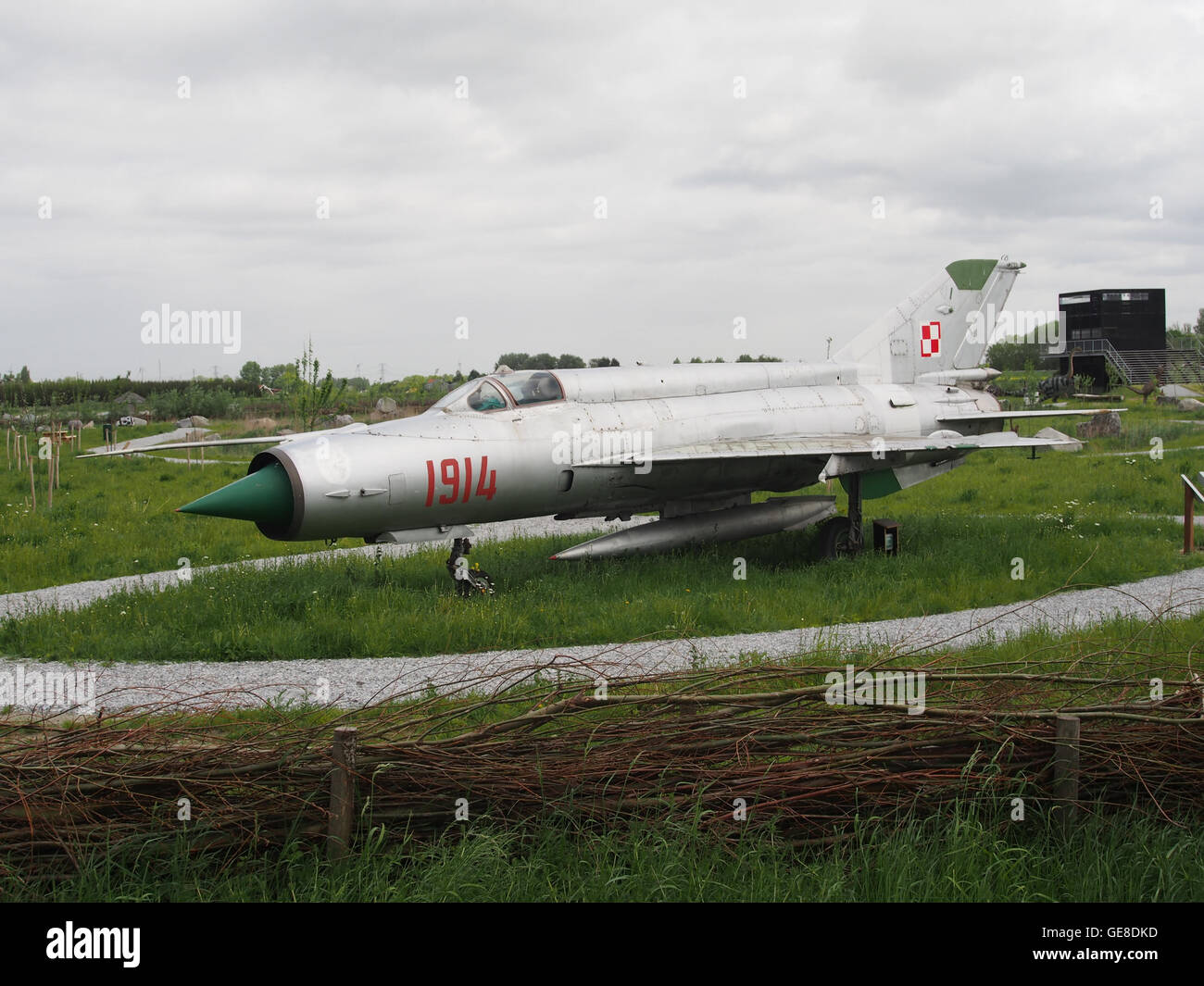 A photograph showing a Polish MiG-21 aircraft, marked with registration ...