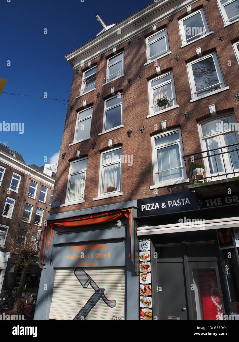 This image showcases Sarphatipark, a well-known park in Amsterdam. The ...