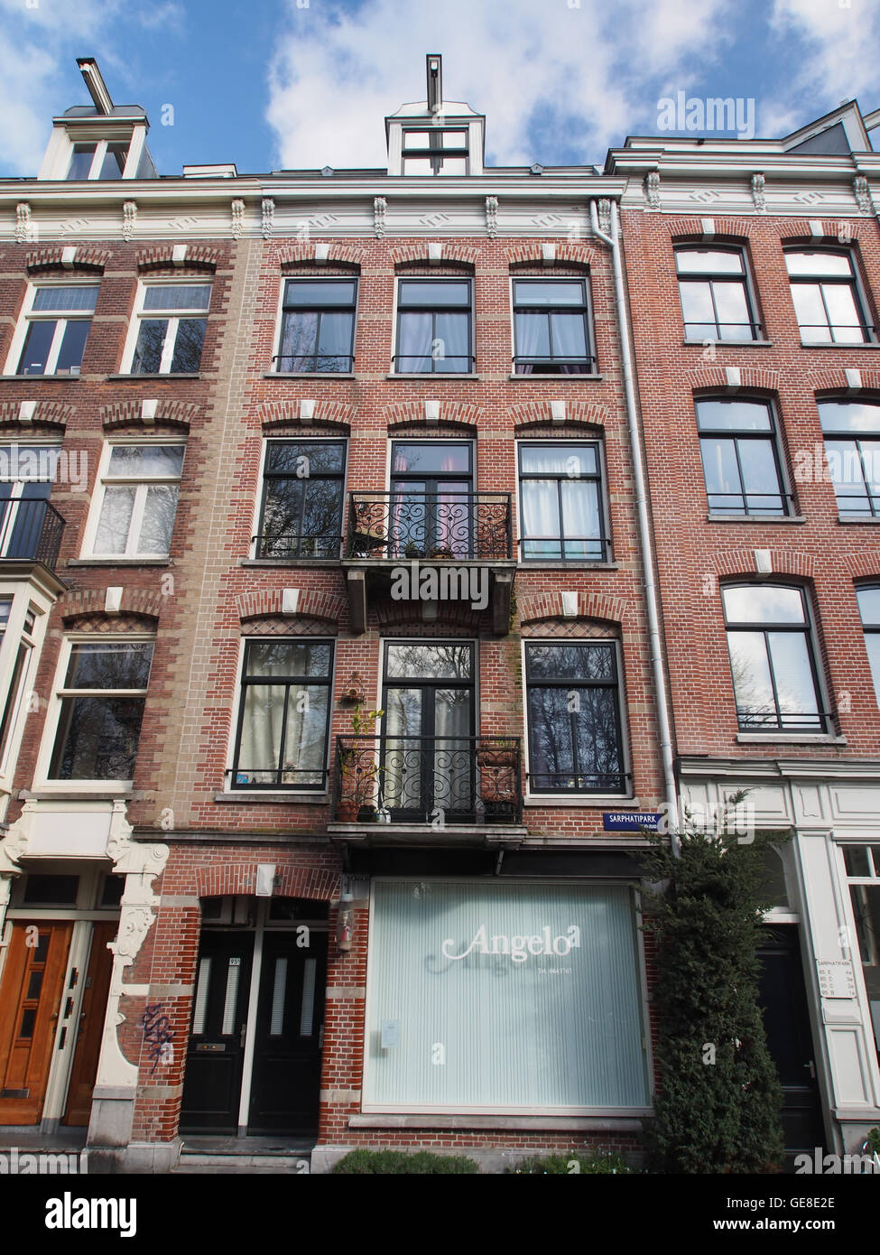 This image captures Sarphatipark, a park located in Amsterdam, known ...