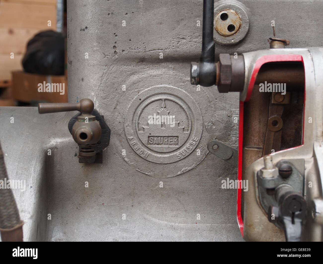 This image features a Saurer Suisse openwork motor on display at the ...