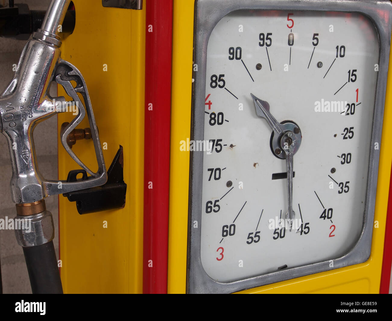 The image captures a vintage sealed shell benzine pump, a relic of ...