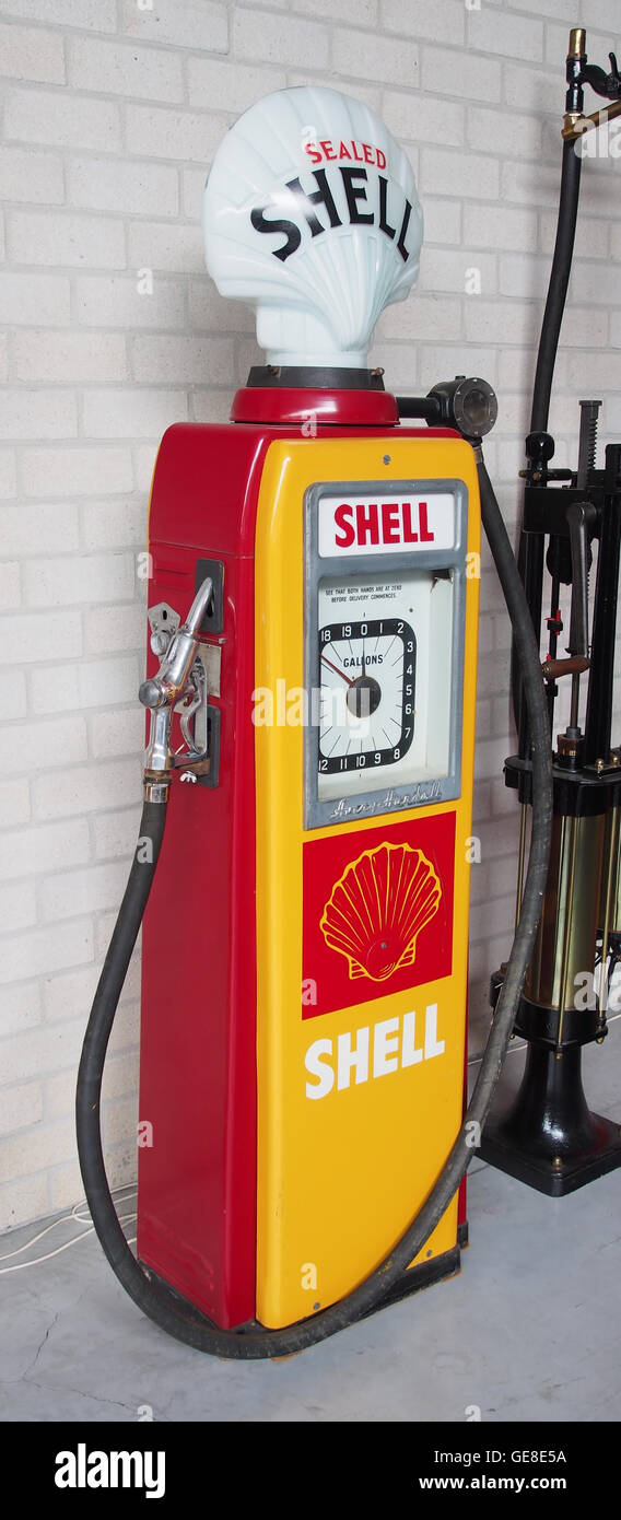 This image of a sealed shell benzine pump is an example of vintage ...