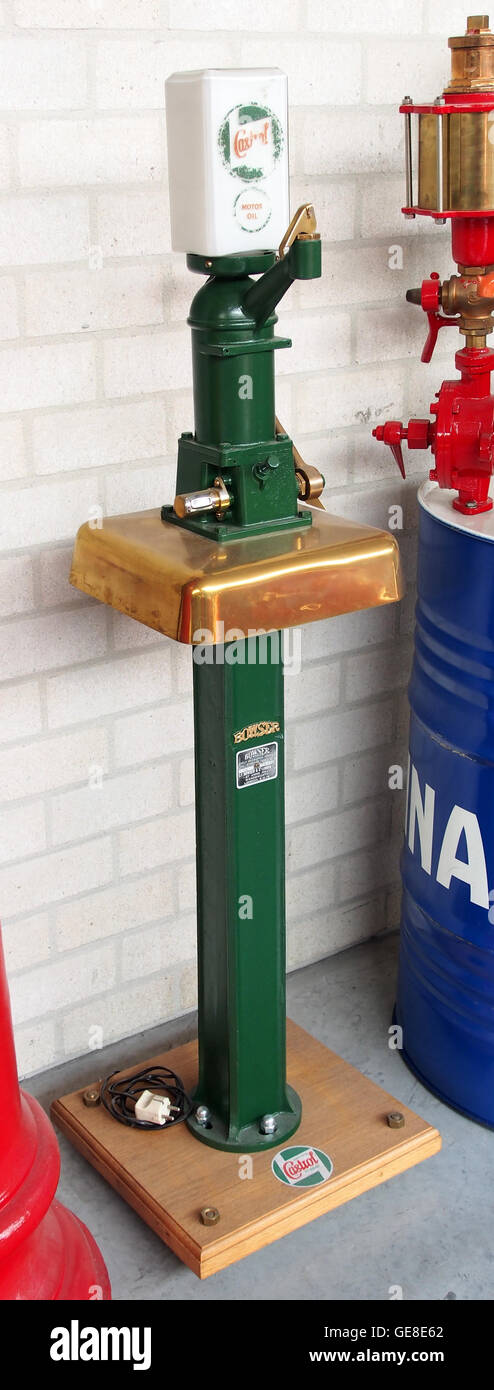 This image features a vintage Castrol pump by SF Bowser & Co., a well ...