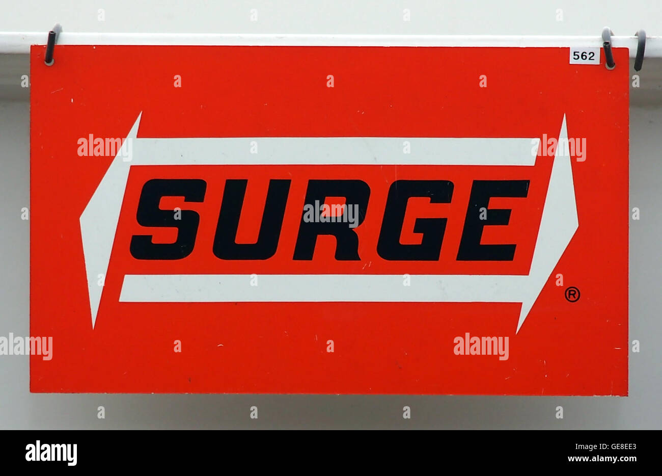 This enamel advertising sign for 'Surge' highlights a vintage style of ...