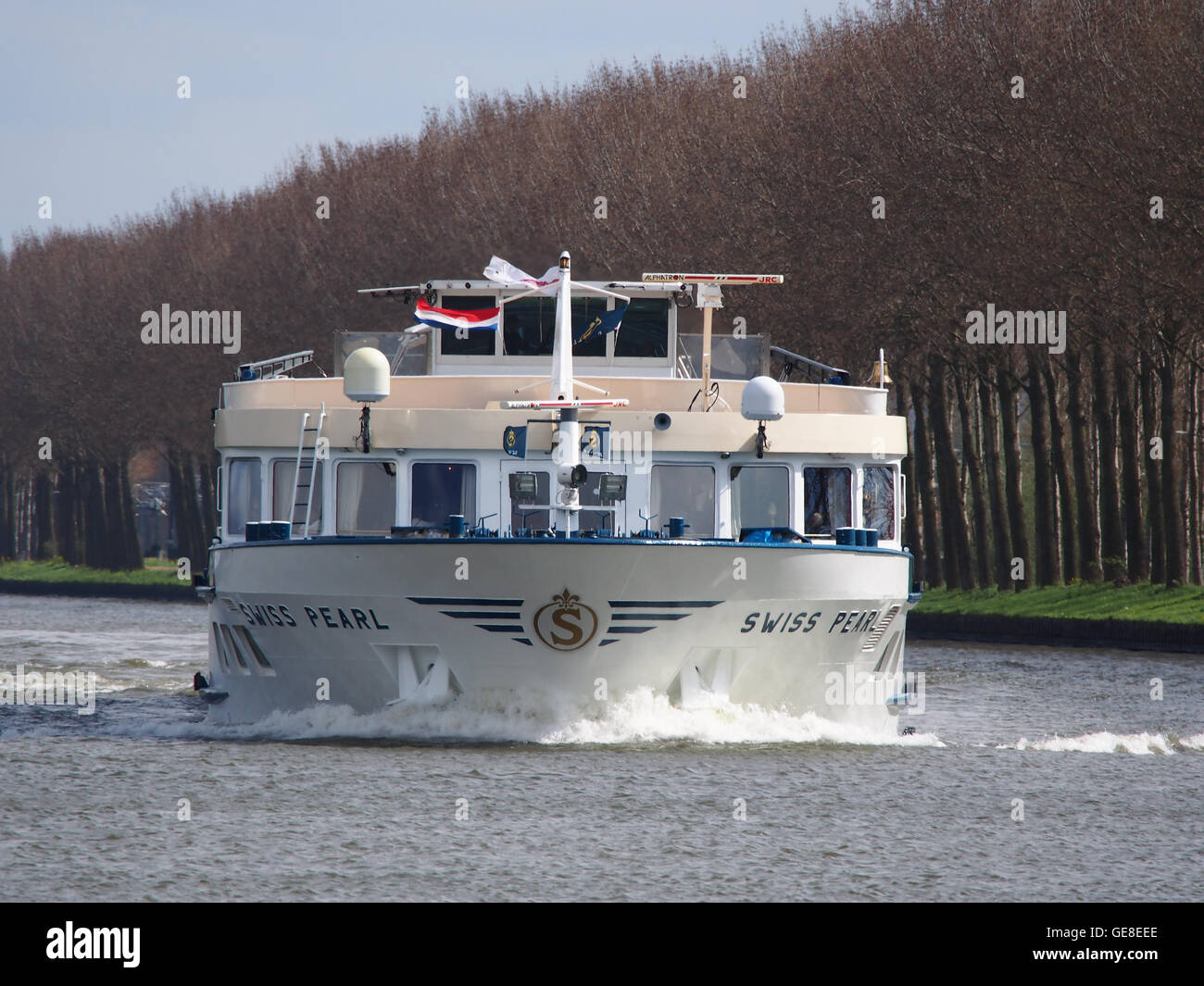 The Swiss Pearl, a ship launched in 1993, is depicted navigating the ...