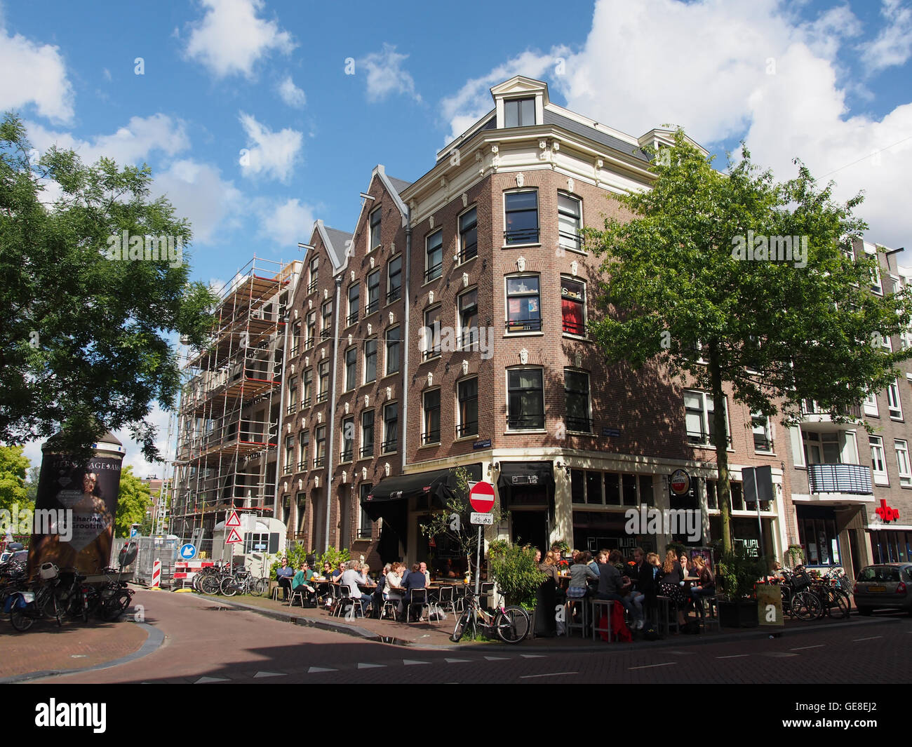 This historical photograph captures a view of the intersection between ...