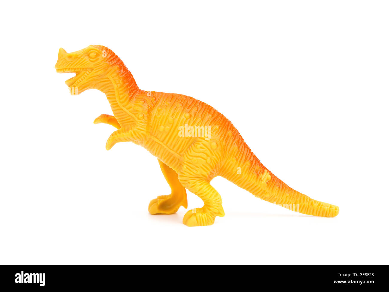side view orange plastic dinosaur toy on a white background Stock Photo ...
