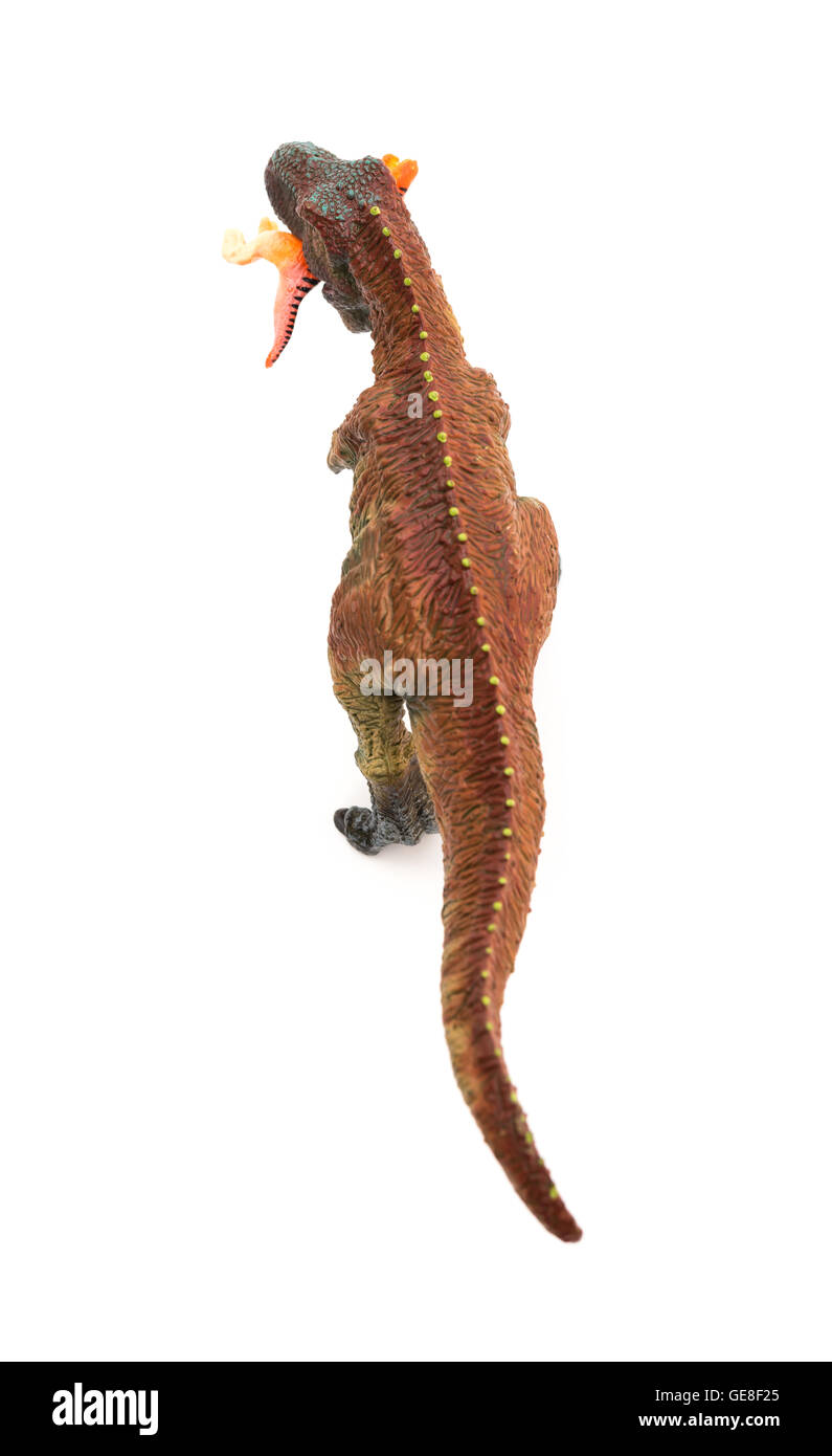 top view tyrannosaurus toy catching a smaller disonaur on white ...