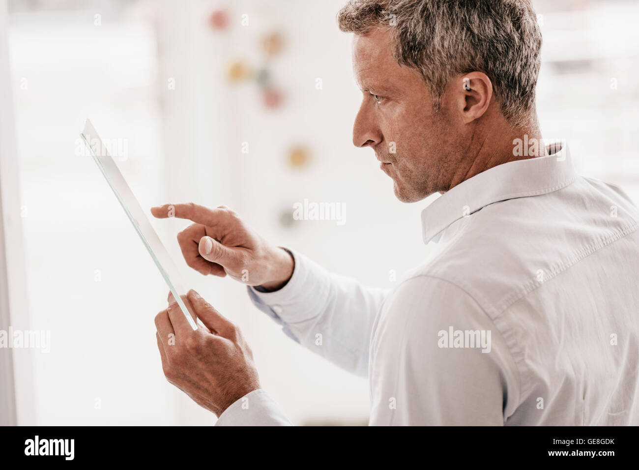 Businessman touching glass screen, future of communication Stock Photo ...