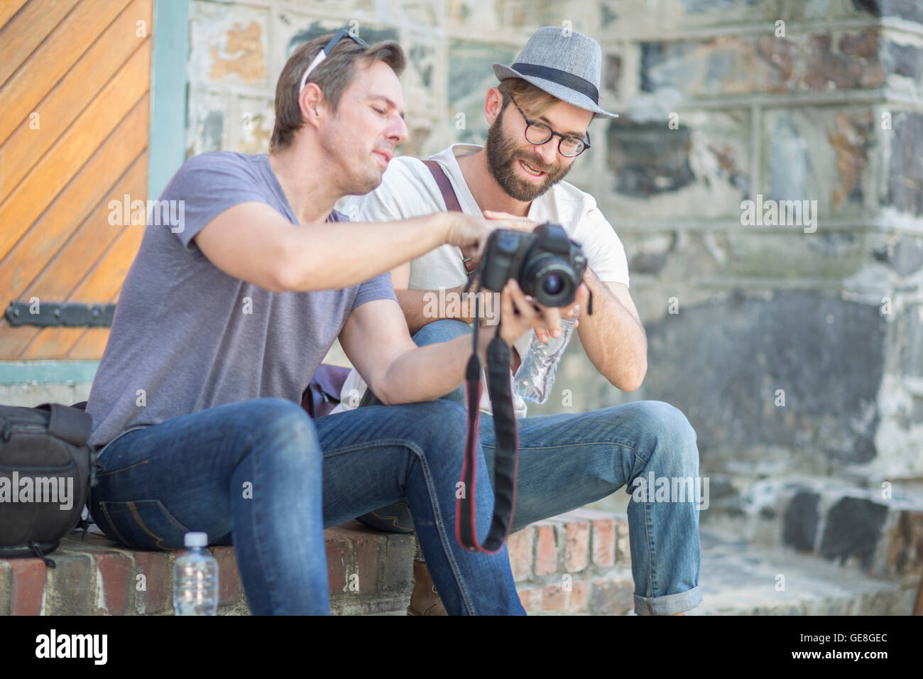 Two men with camera outdoors Stock Photo - Alamy