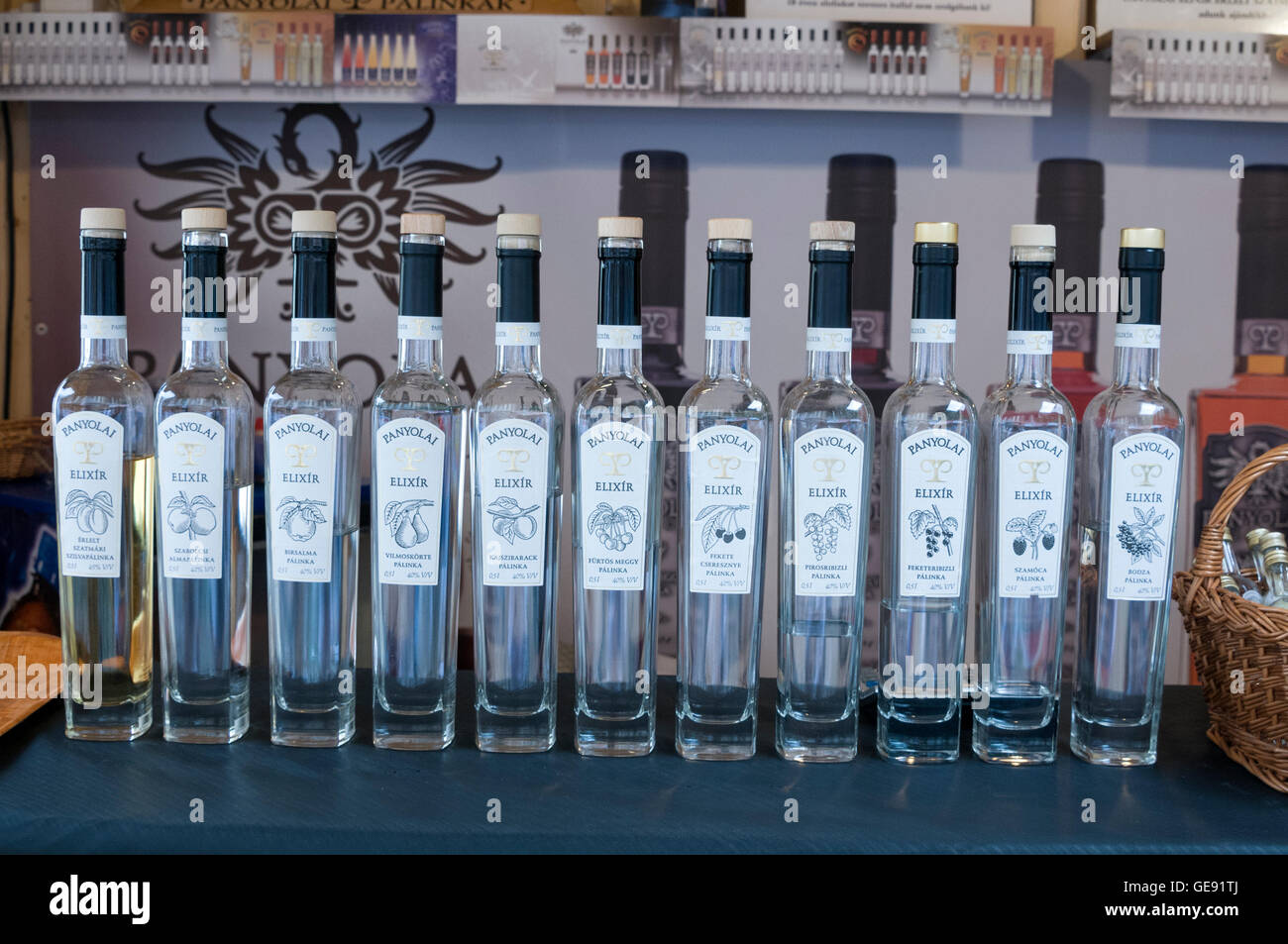 A row of bottles of Hungarian Pallnka is a national drink. It is a ...