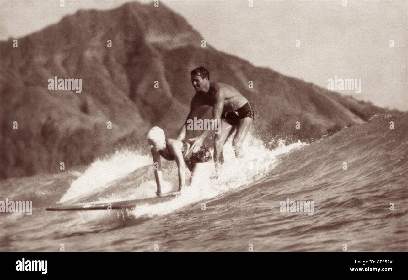 Tom Blake and Odetta Bray tandem surfing in the 1930s at Waikiki in ...