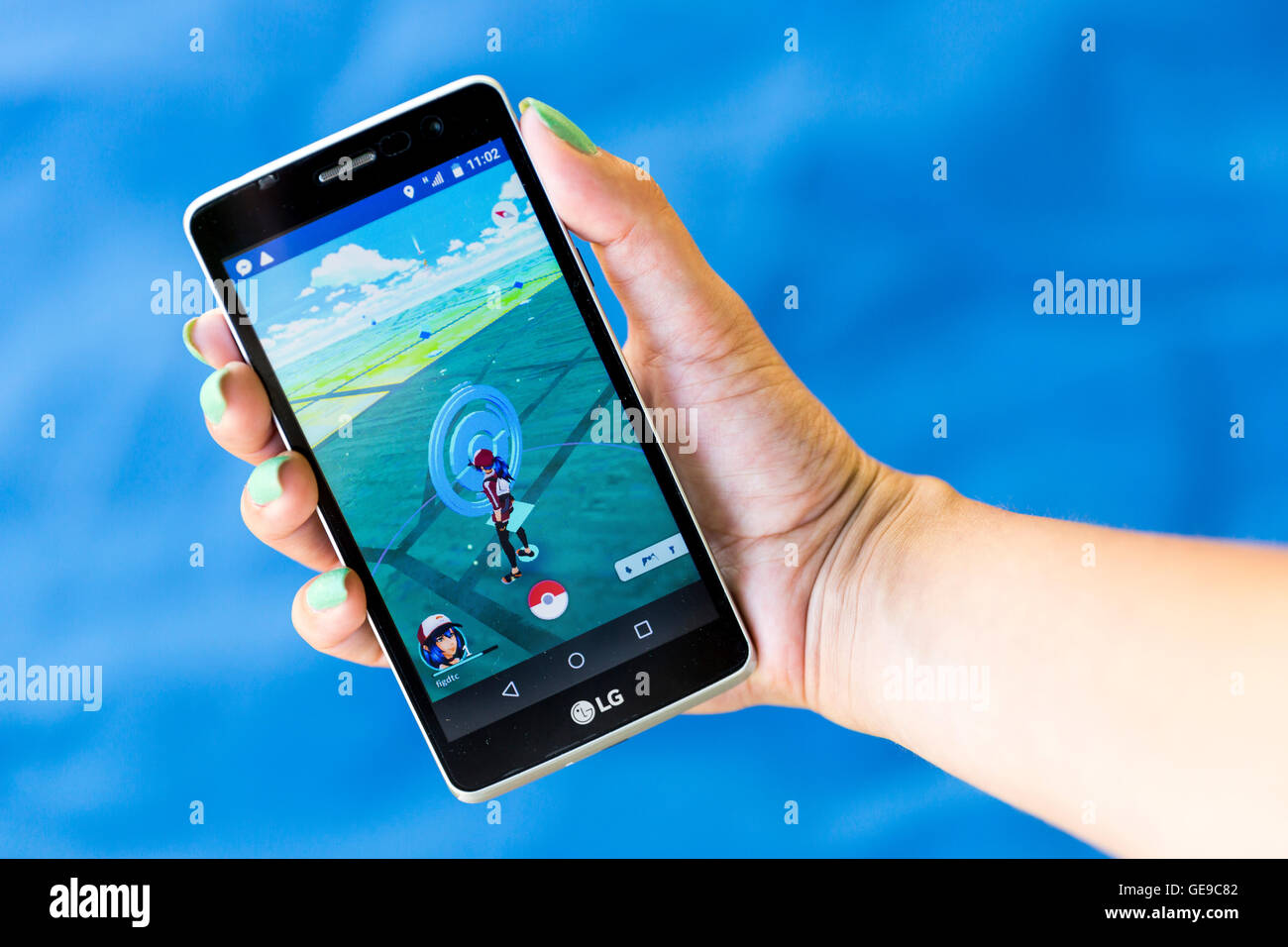 Sofia, Bulgaria - July 23, 2016: Woman holds in her hand a mobile phone ...