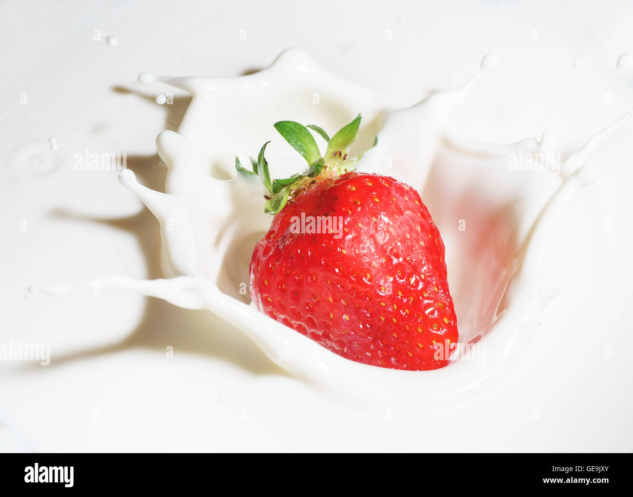 Milk splashes with fruit hi-res stock photography and images - Alamy