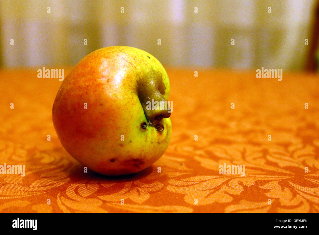 Apple with features of a human face Stock Photo - Alamy