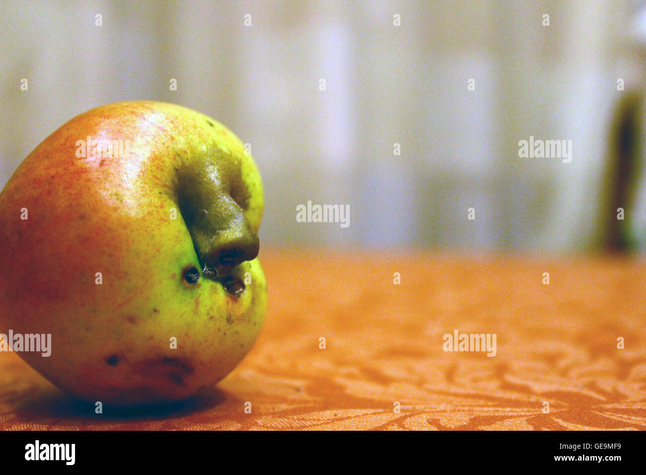 Apple with features of a human face Stock Photo - Alamy