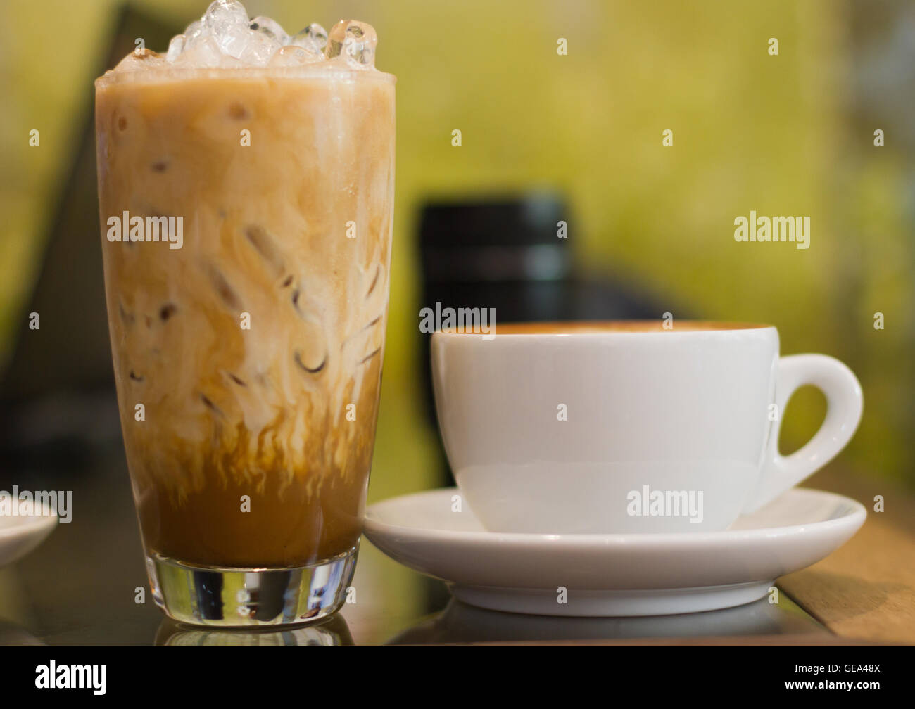 Ice and hot coffee late Stock Photo - Alamy