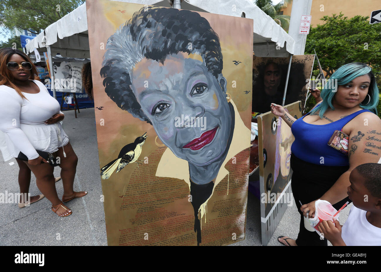 Miami, Florida, USA. 23rd July, 2016. Festival patrons view fine art ...