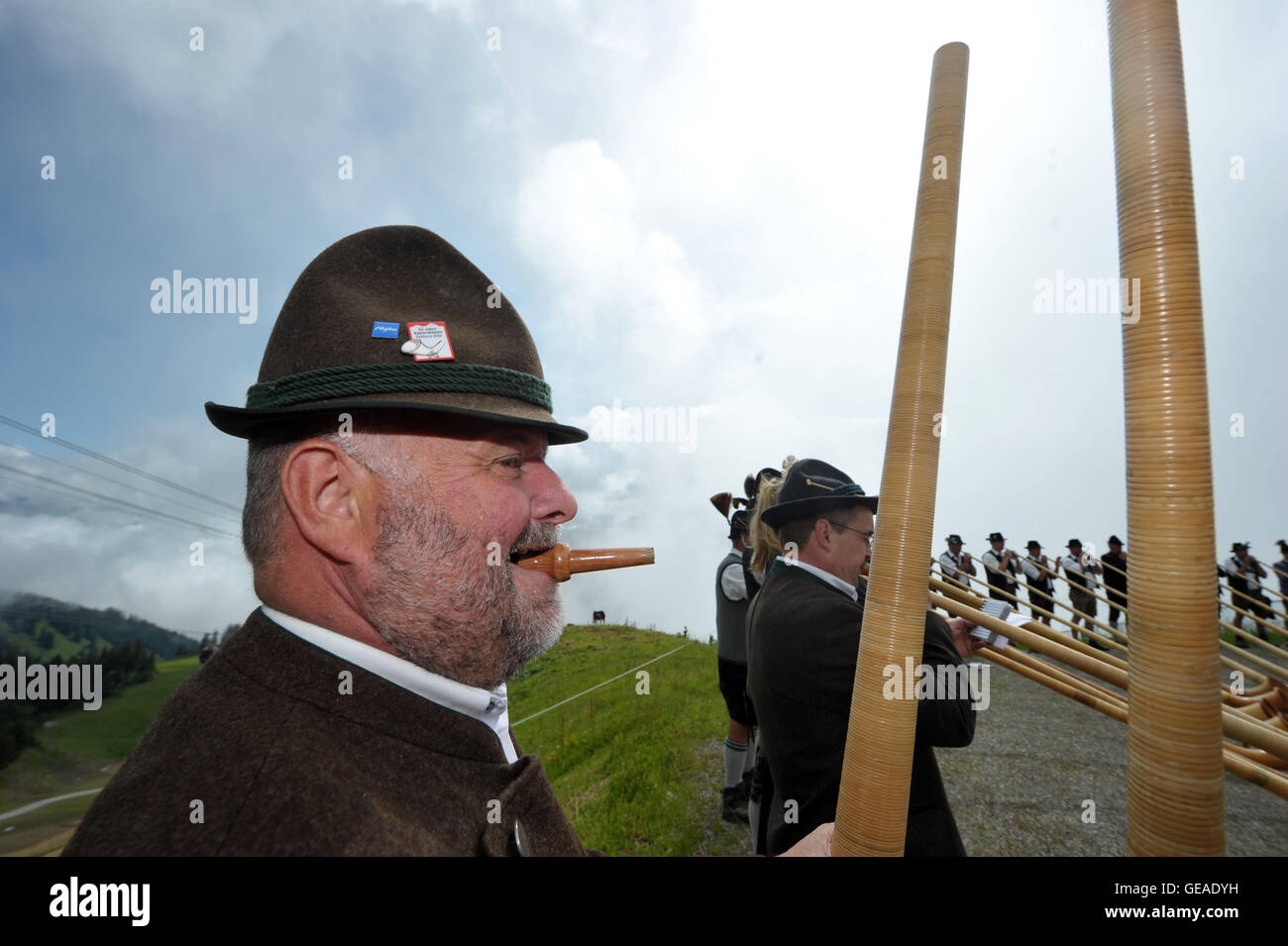 Alpine horn blower hi-res stock photography and images - Alamy