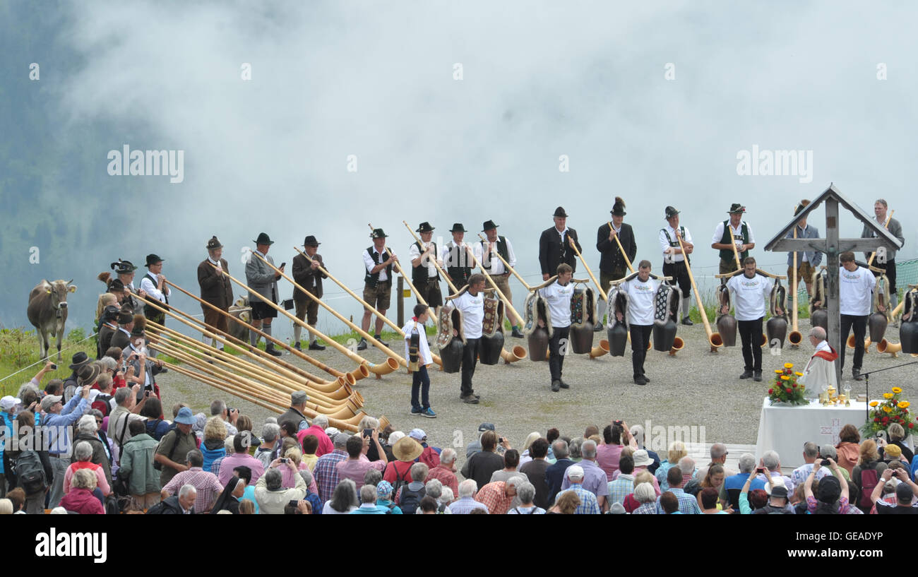 Alphornblaesers (traditional Alpine horn blowers) play atop the ...