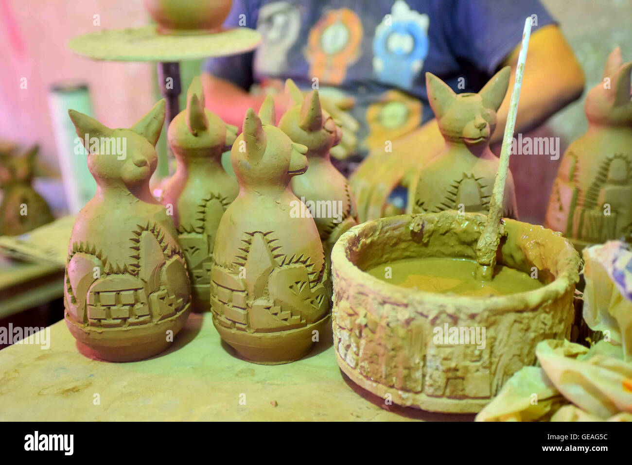 Cairo, Egypt. 24th July, 2016. Pottery vessels are seen drying at a ...