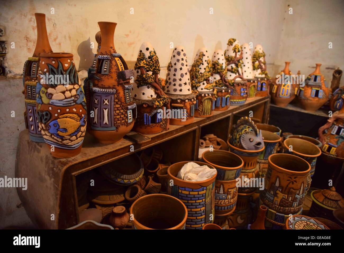 Cairo, Egypt. 24th July, 2016. Pottery vessels are seen drying at a ...