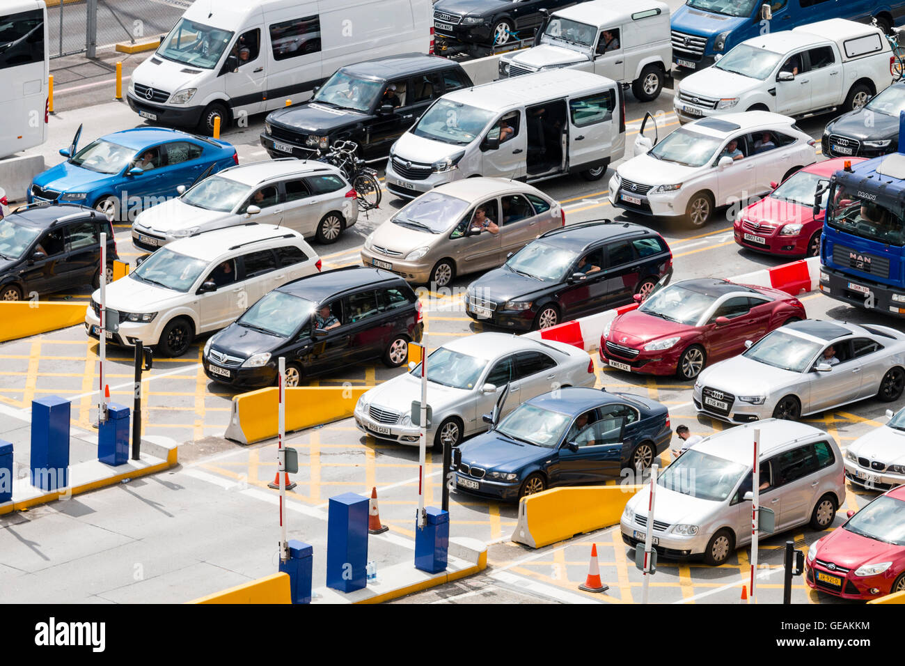 Traffic queue. 10 lanes of traffic queuing for Border Controls at the ...