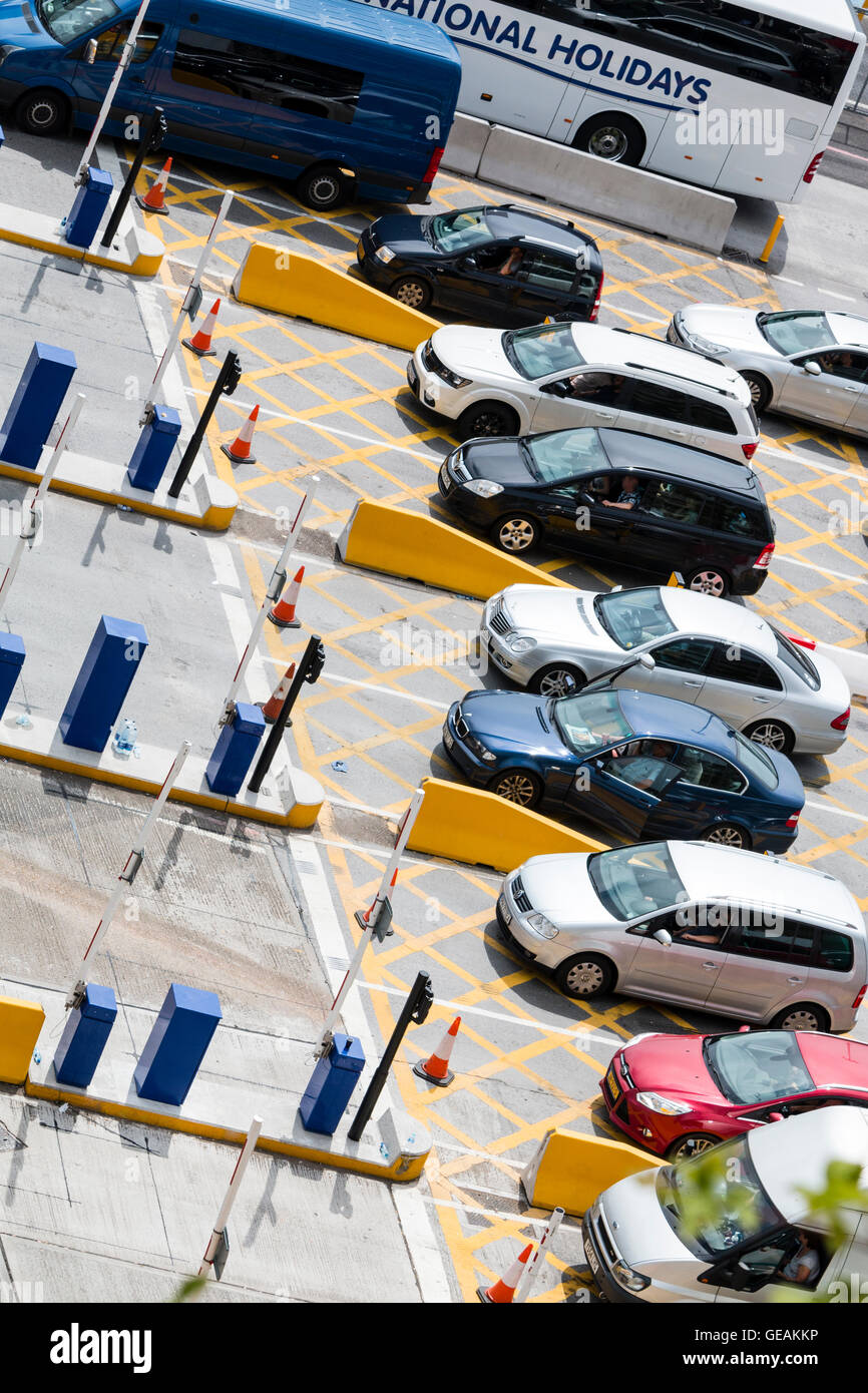 Traffic queue. Lanes of traffic queuing for Border Controls at the ...