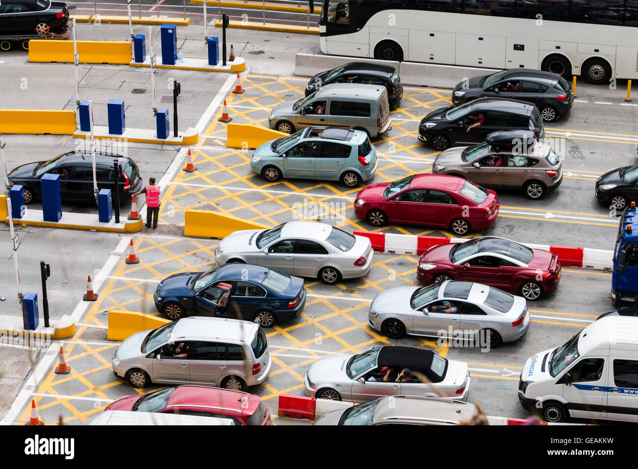 Traffic queue. Lanes of traffic queuing for Border Controls at the ...