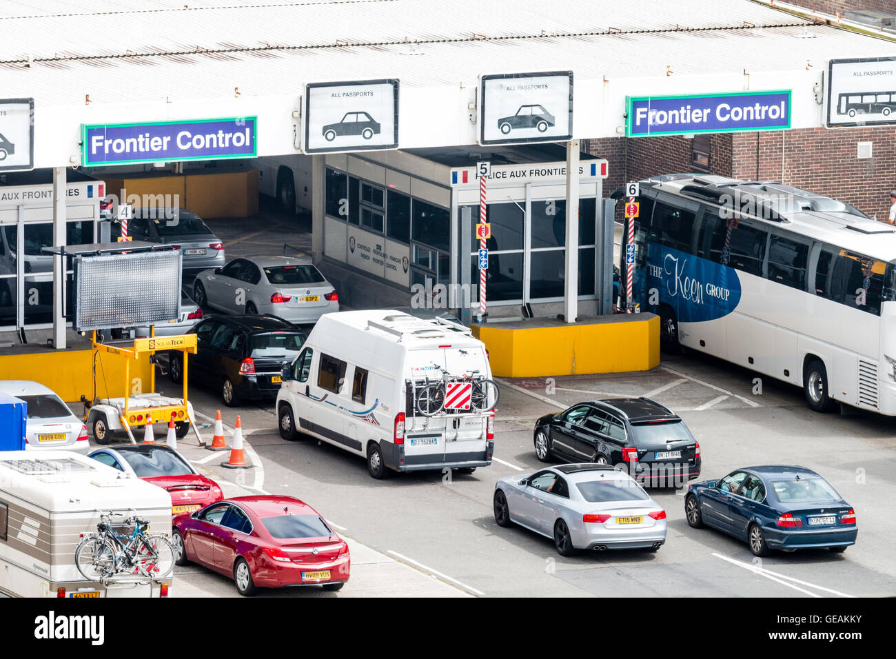 Passenger transport, cars and buses queueing at the French juxtaposed ...