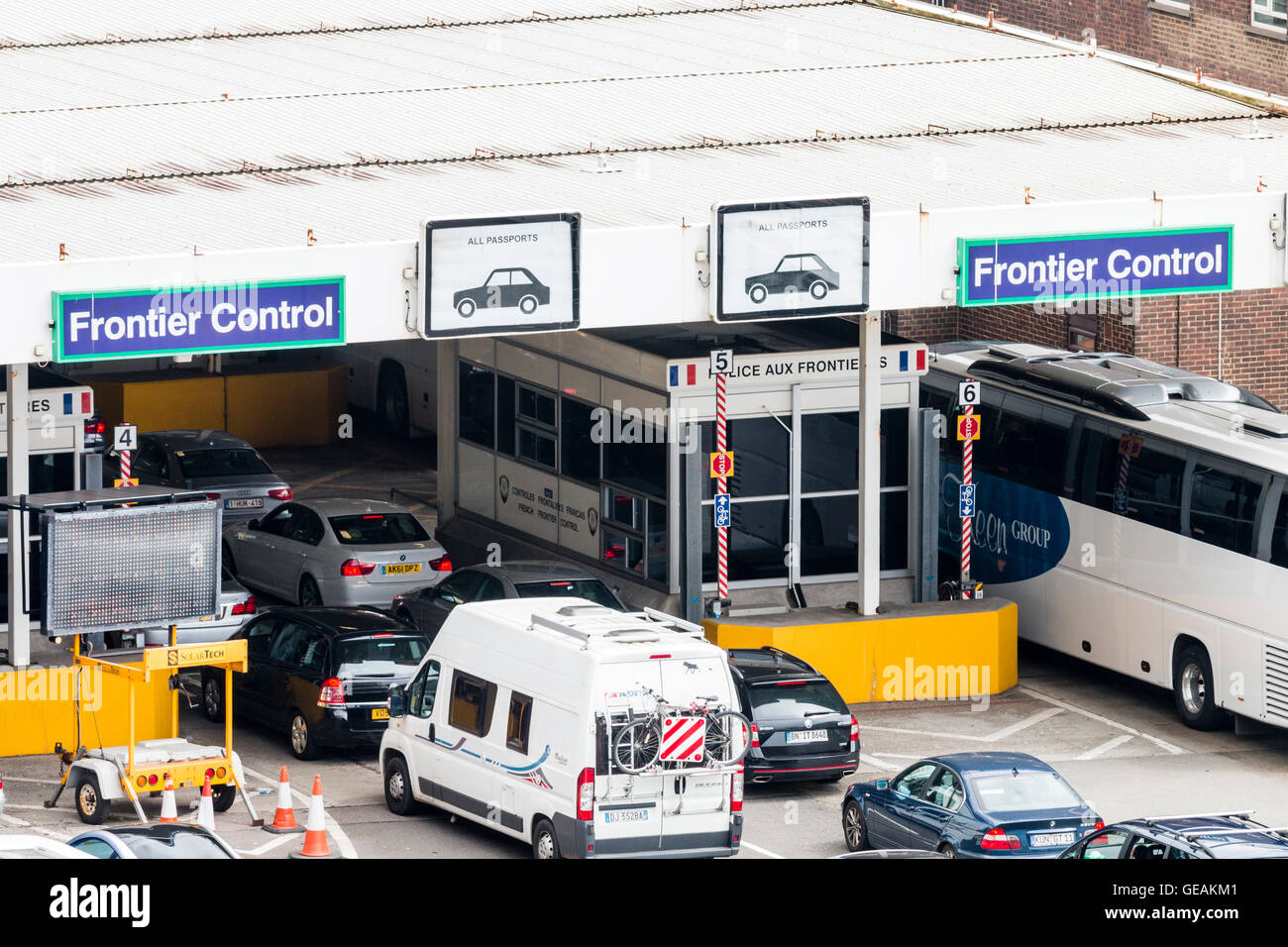 Passenger transport, cars and buses queueing at the French juxtaposed ...