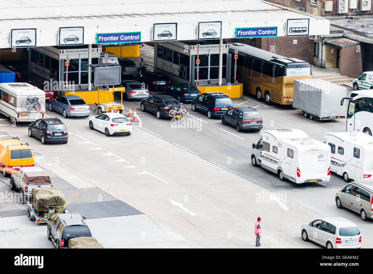 Passenger transport, cars and buses queueing at the French juxtaposed ...