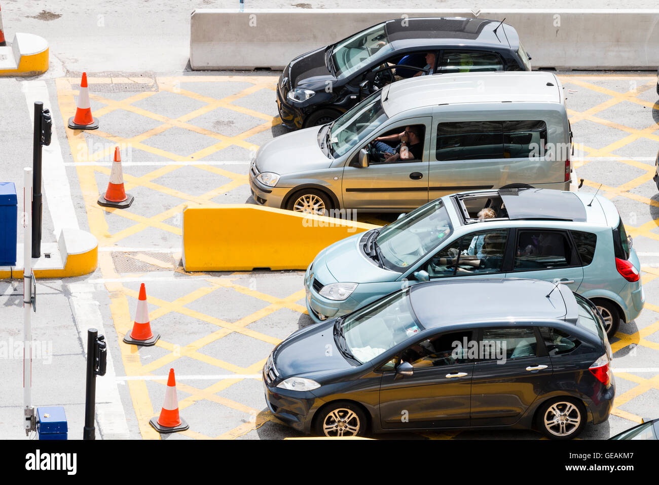 Traffic queue. Lanes of traffic queuing for Border Controls at the ...