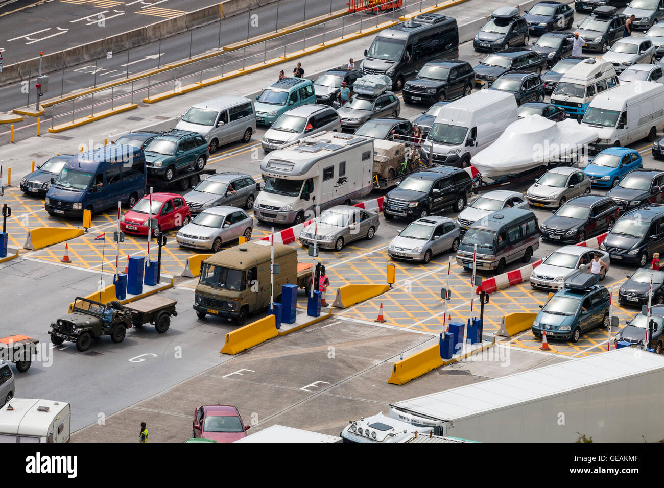 Traffic queue. 10 lanes of traffic queuing for Border Controls at the ...