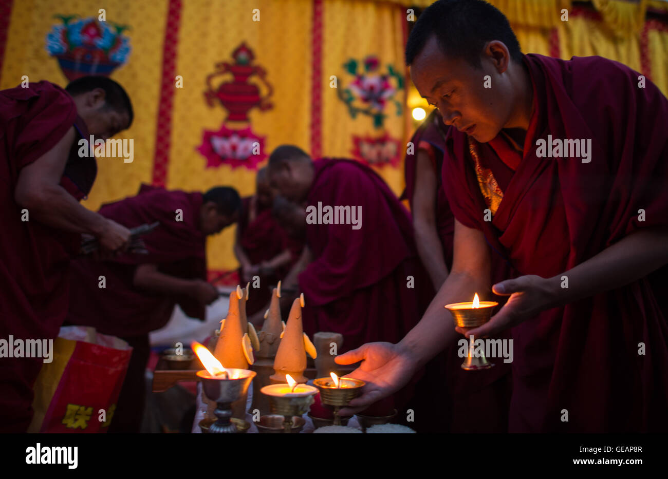 Xigaze, China's Tibet Autonomous Region. 25th July, 2016. Monks attend ...