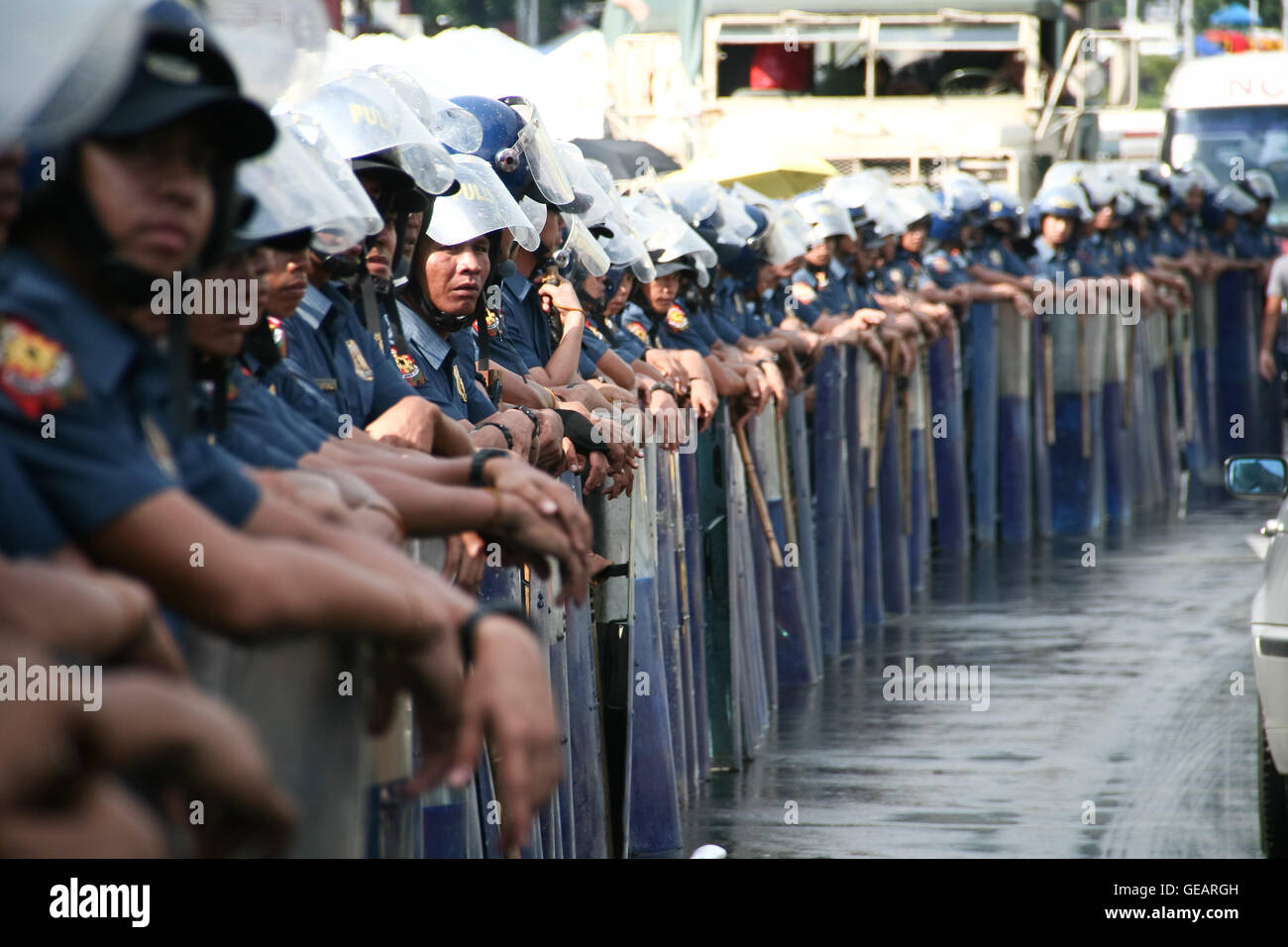 Philippines. 25th July, 2016. Thousands of police line the street going ...