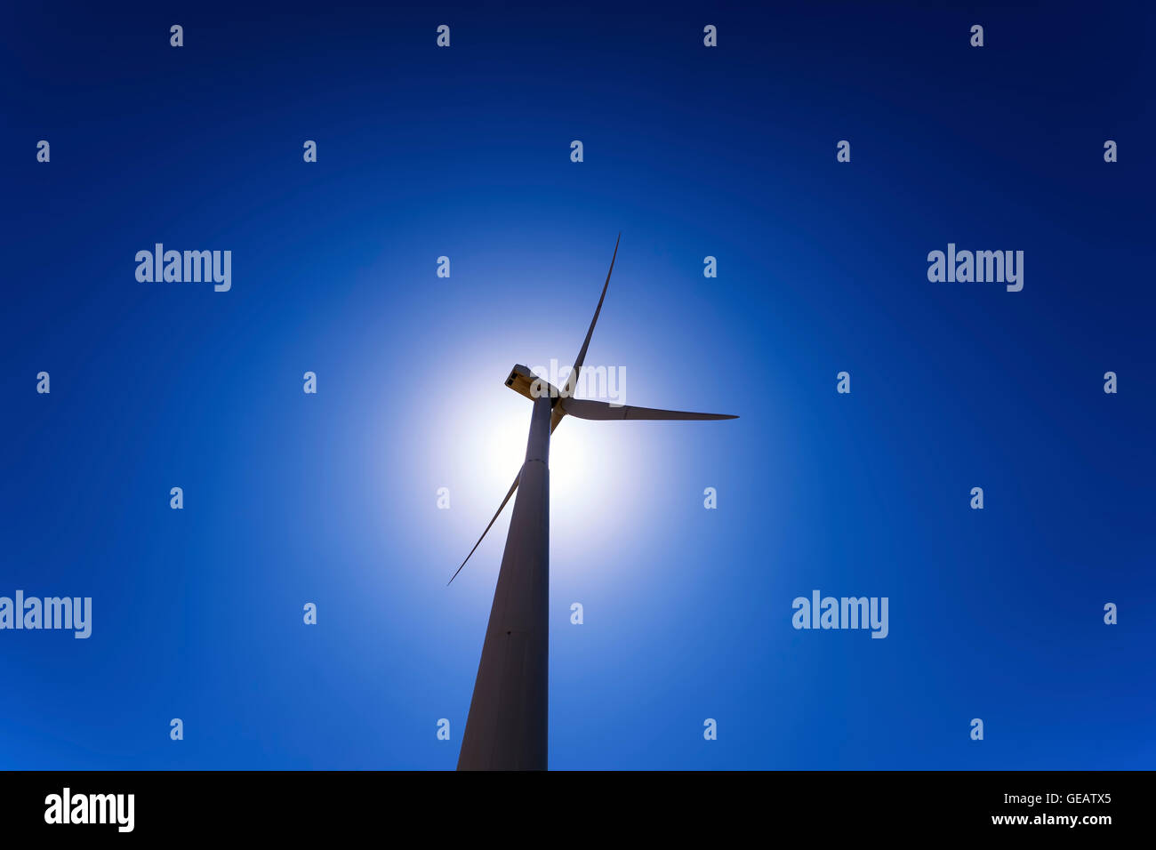 Wind turbine against the sun Stock Photo - Alamy