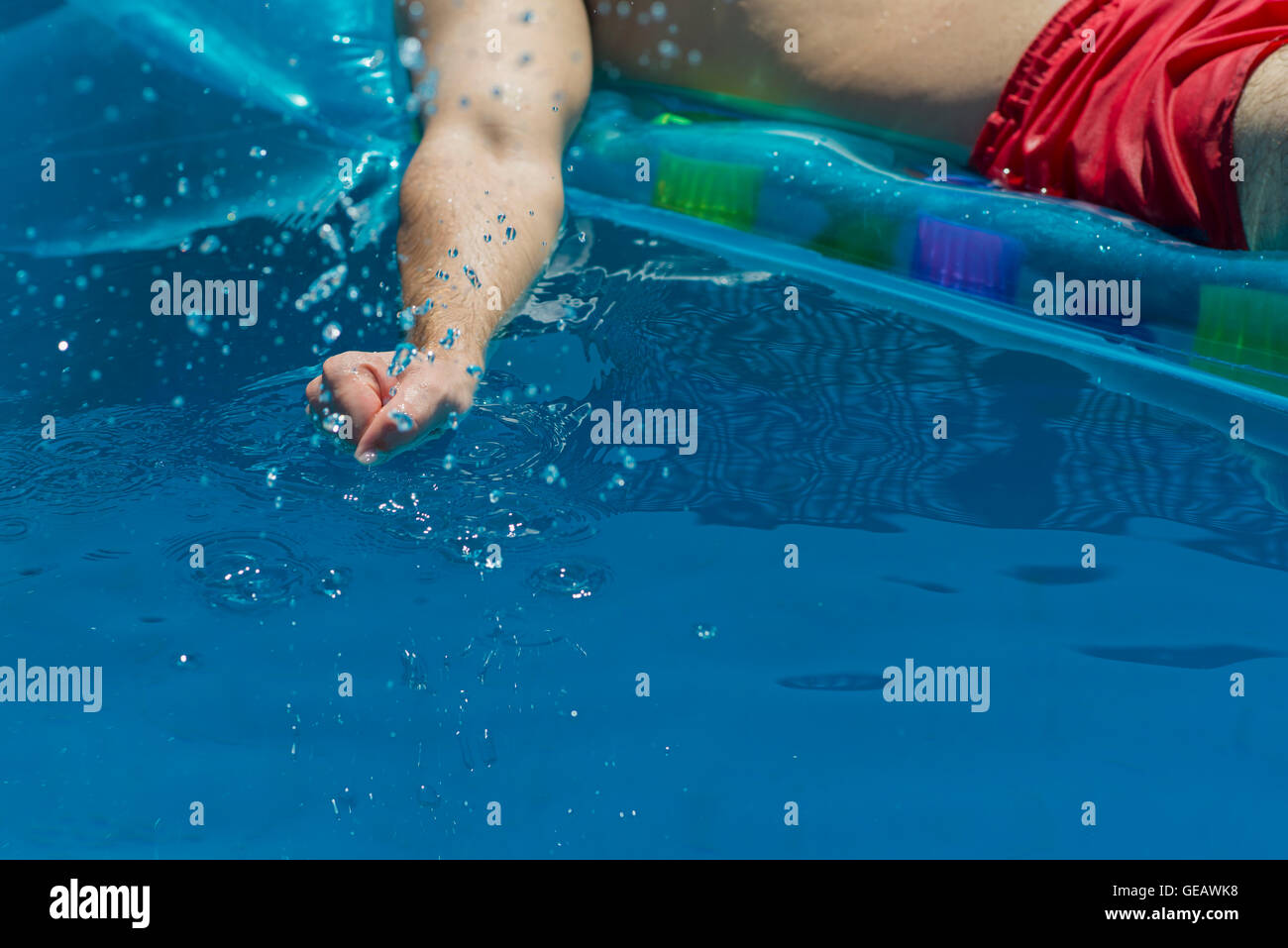 Man bathing in hand hi-res stock photography and images - Alamy