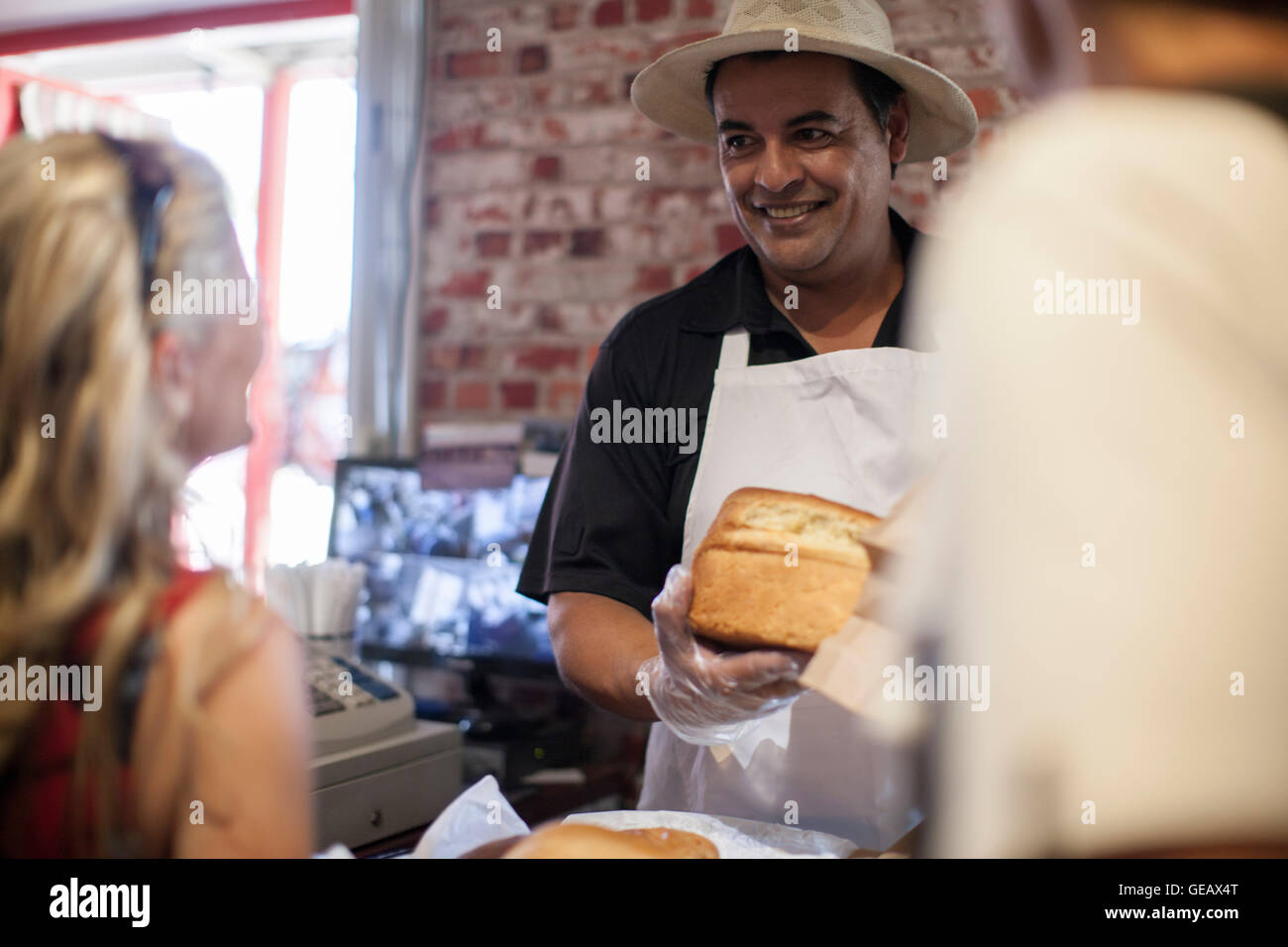 Female shopkeeper in shop hi-res stock photography and images - Alamy