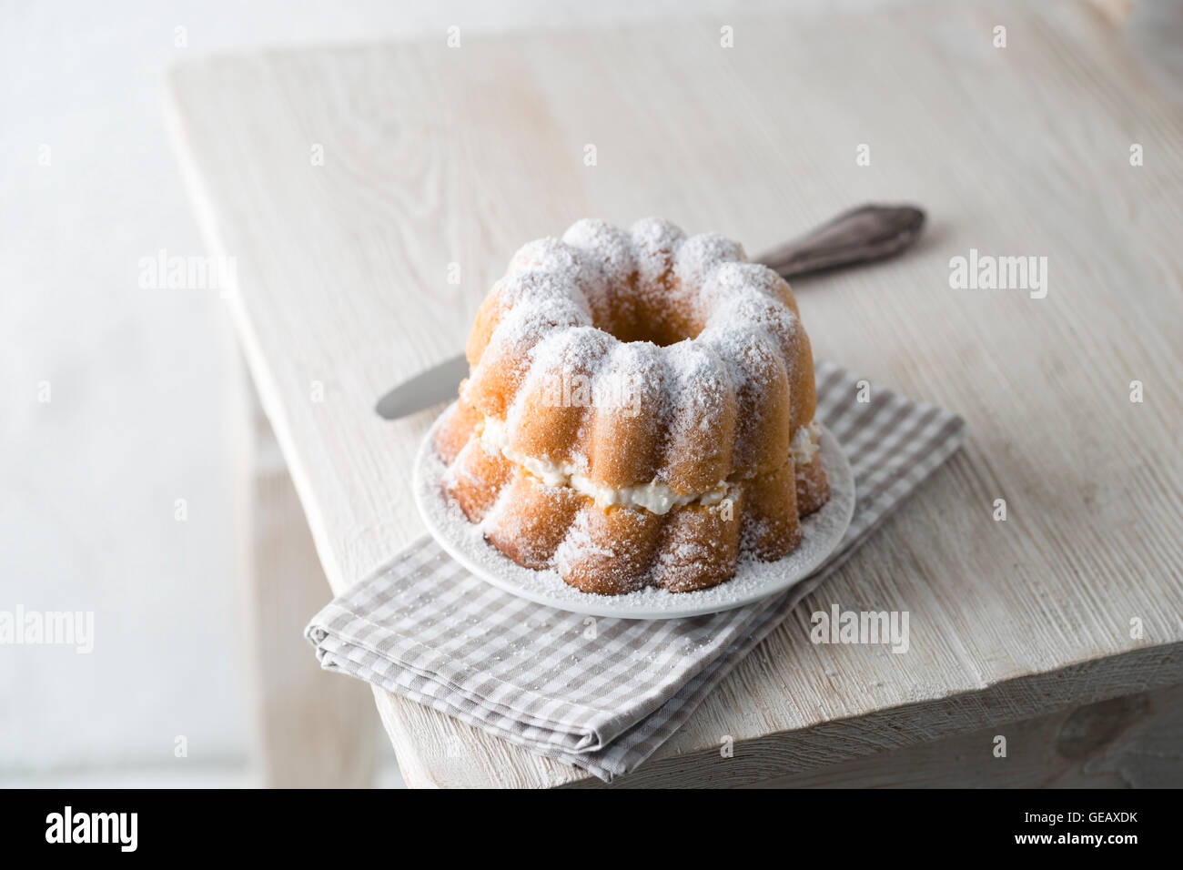 Ring cake filled with elderflower cream Stock Photo - Alamy