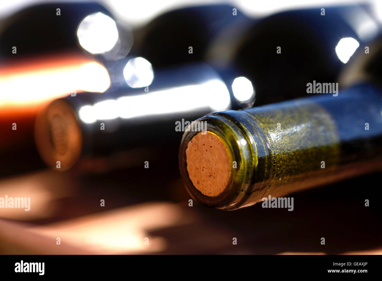 Row of wine bottles Stock Photo - Alamy