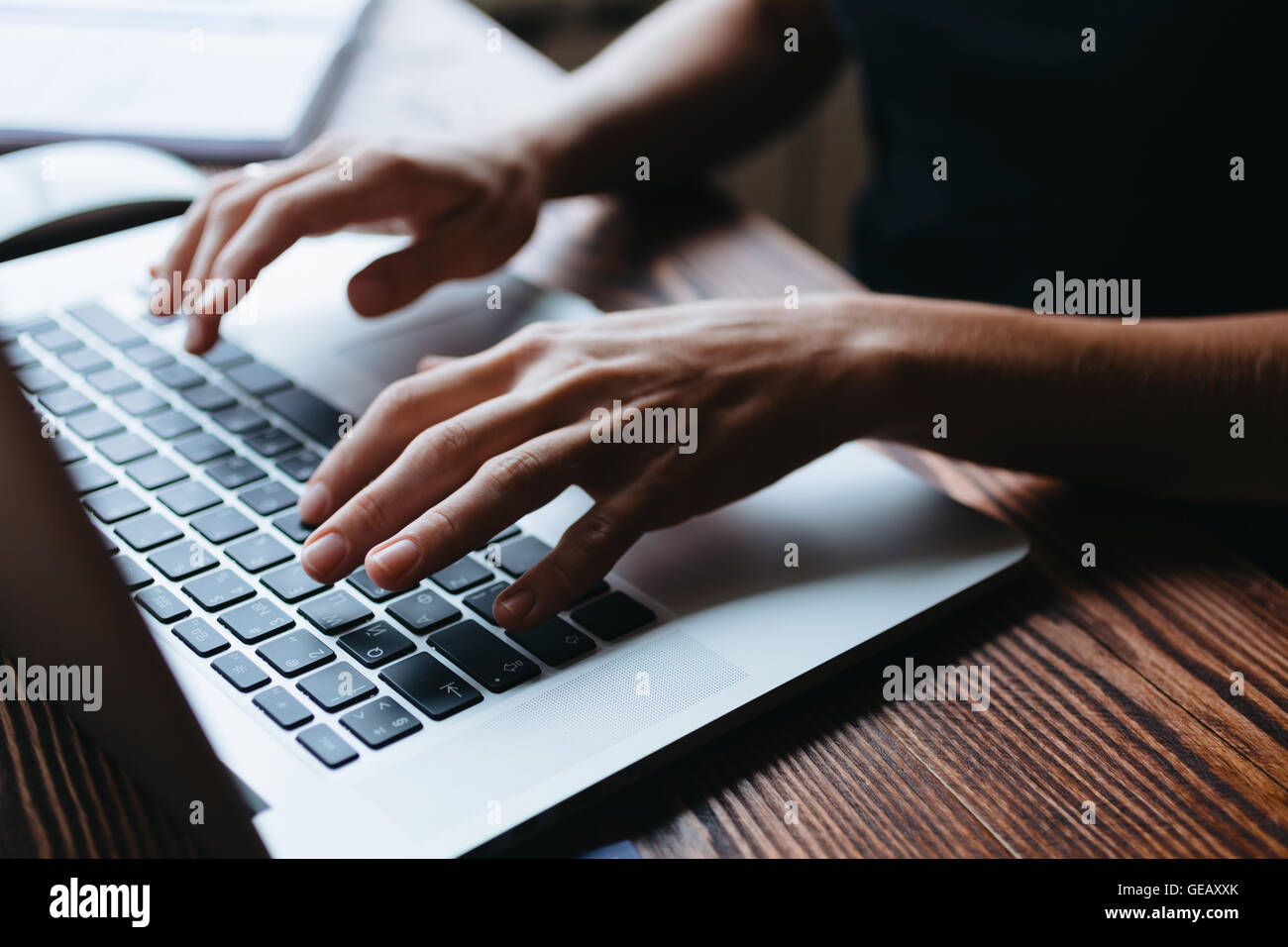 Girl working on computer Stock Photo - Alamy