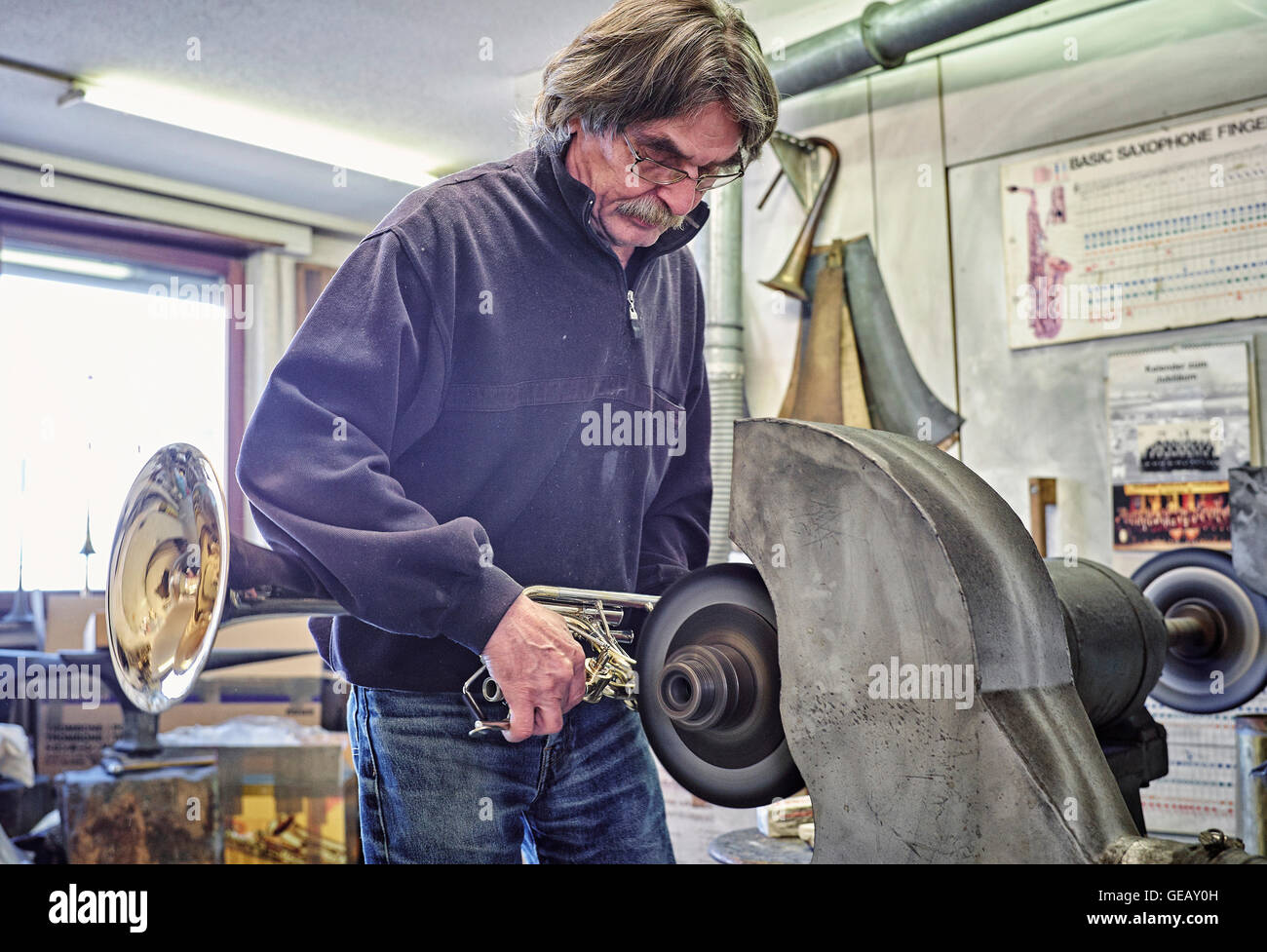 Polishing brass hi-res stock photography and images - Alamy