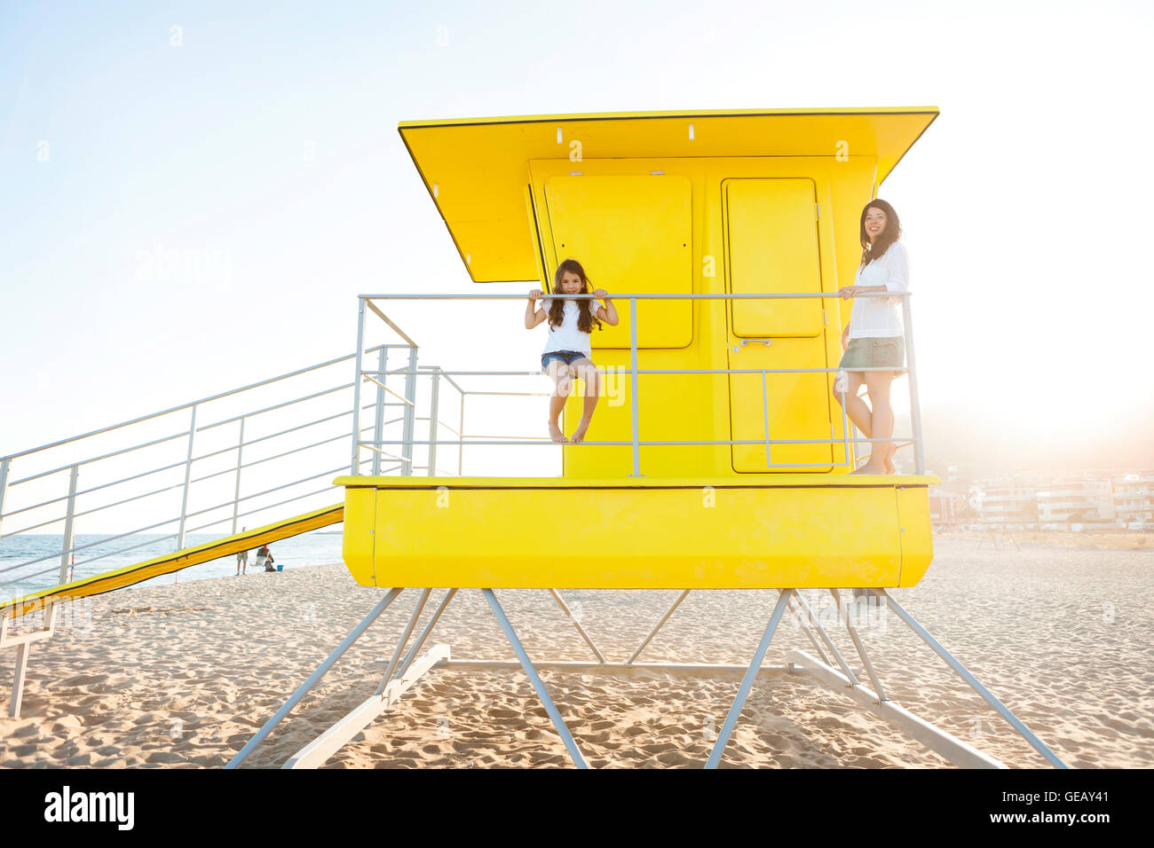 Child standing by a tower hi-res stock photography and images - Alamy
