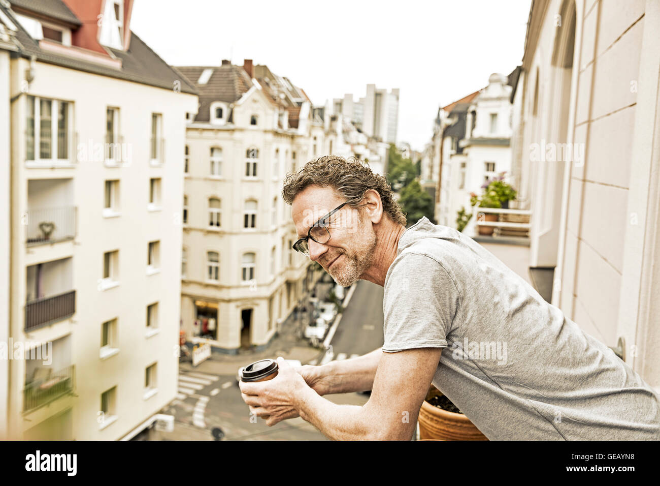 Standing leaning looking down spectacles hi-res stock photography and ...